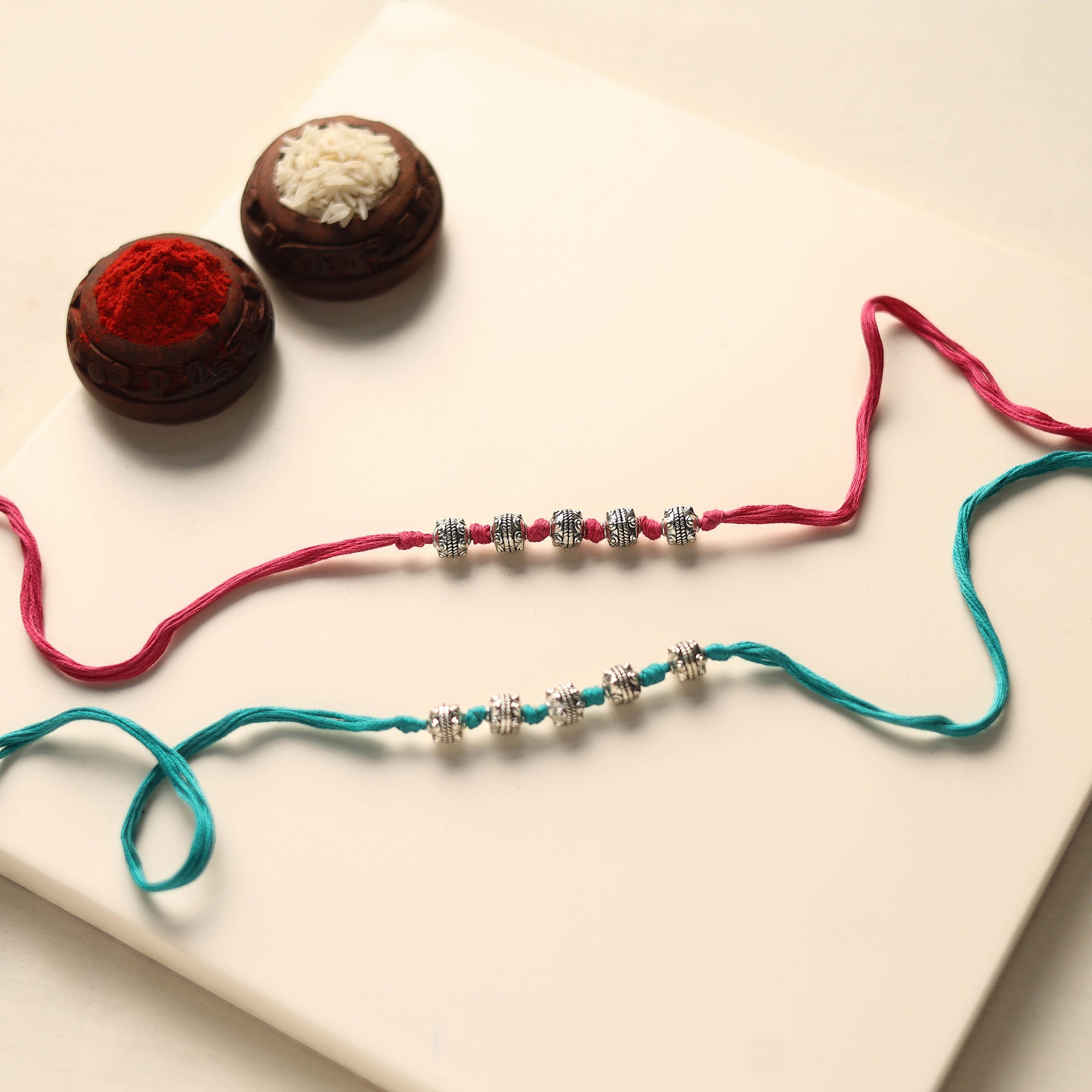 Handmade German Silver Rakhi (Set of 2) – iTokri आई.टोकरी